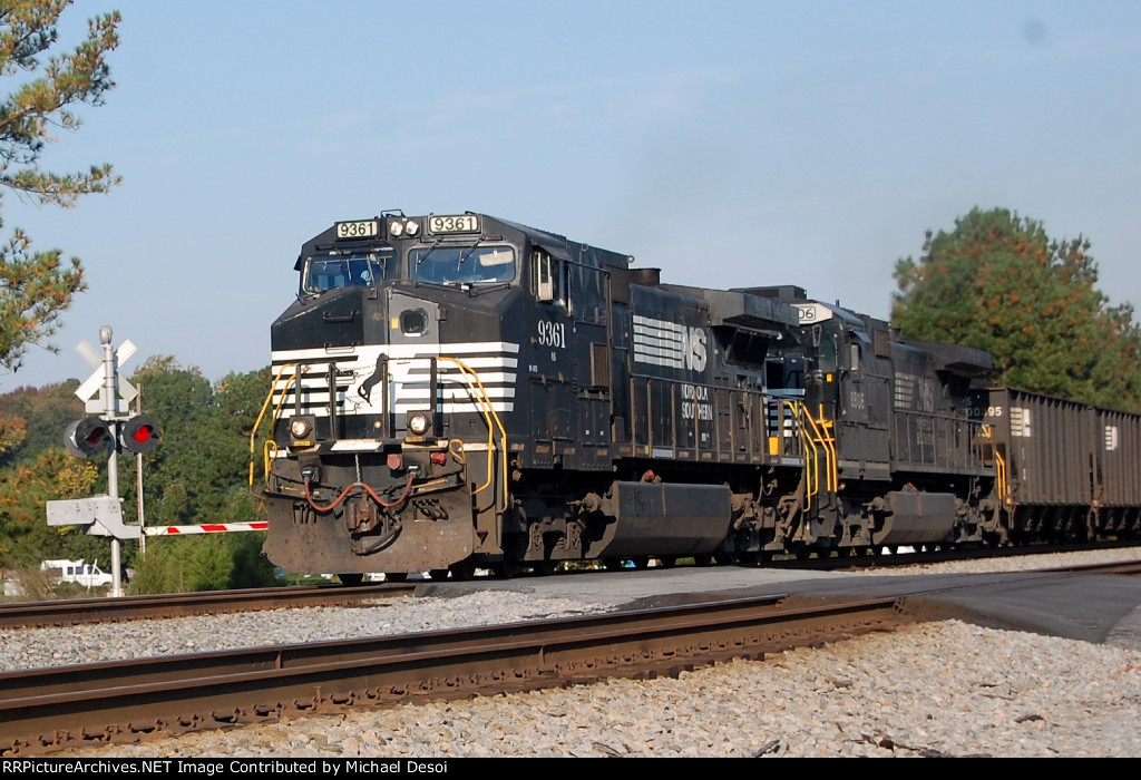 NS C40-9W #9361 leads an eastbound coal train across Ecella Rd.